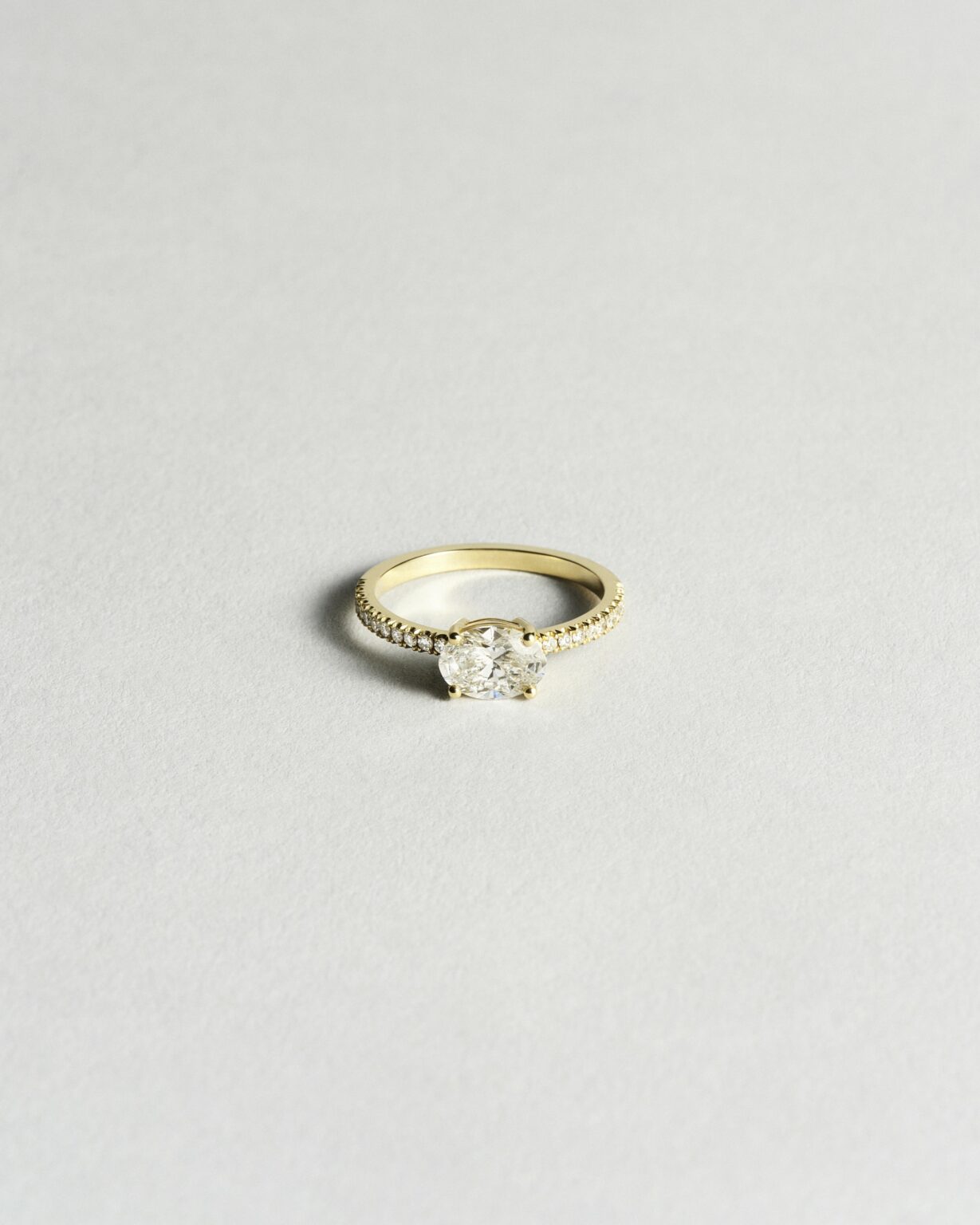 Low-Set Solitaire Oval Diamond Ring Pavé - Norrfolks